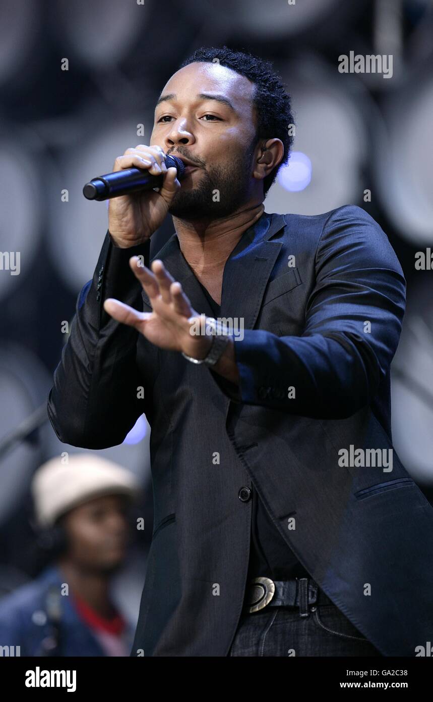 John Legend performs during the charity concert at Wembley Stadium ...