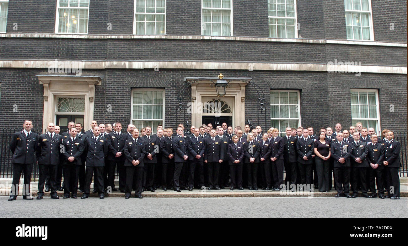 Officers line up on the steps of No. 10 Downing Street before today's ...