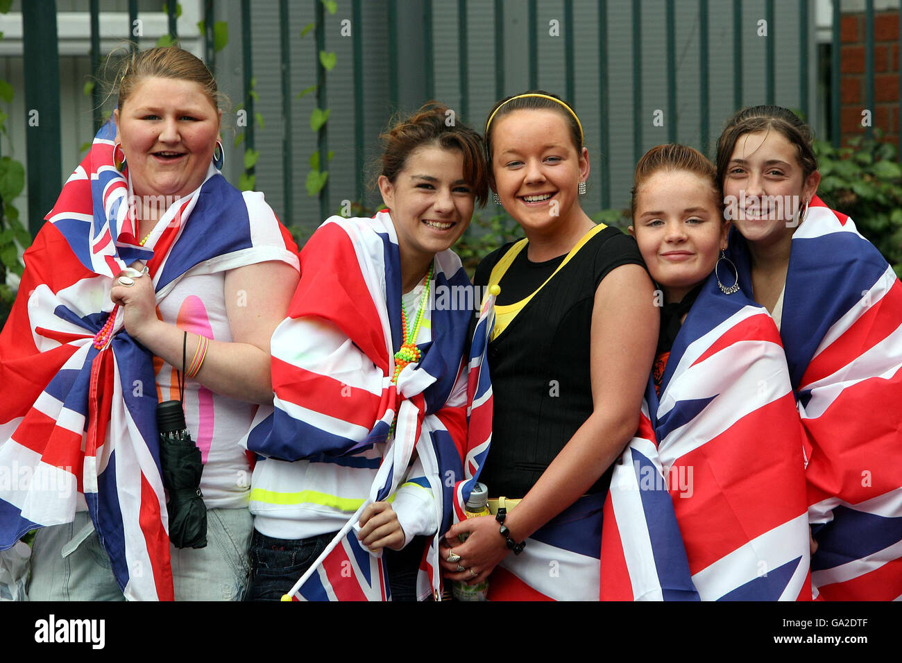 Watching an orange parade hi-res stock photography and images - Alamy