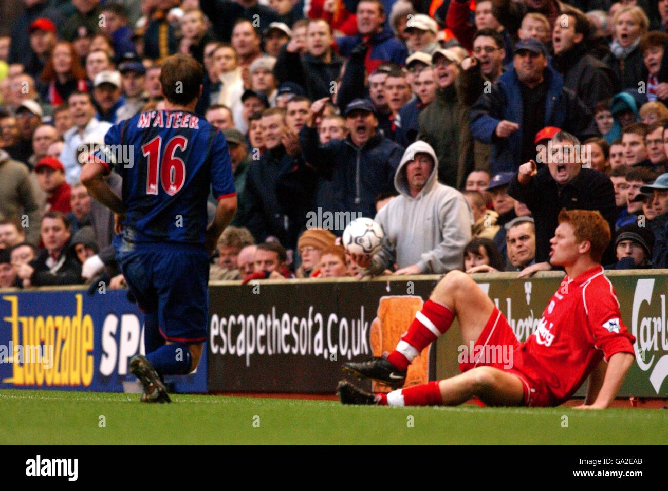 Liverpool's John Arne Riise is fouled by Sunderland's Jason McAteer ...