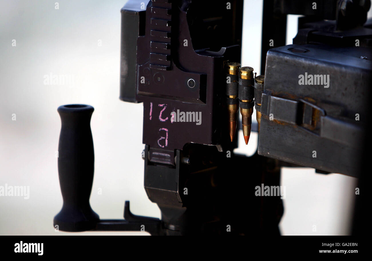 Bullets placed in a machine gun on the side of a US Blackhawk ...