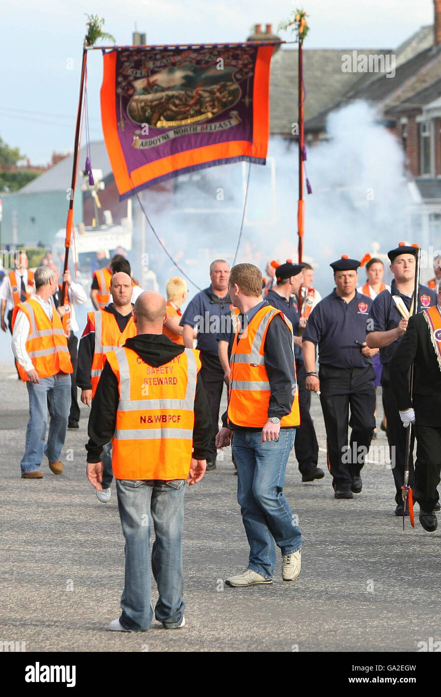 Fireworks explode as the controversial Orange Parade passes through the ...