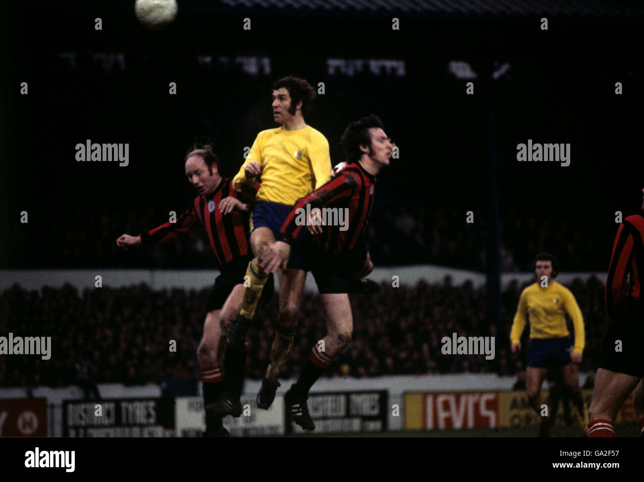 Chelsea's Peter Osgood jumps for the header between Manchester City's ...