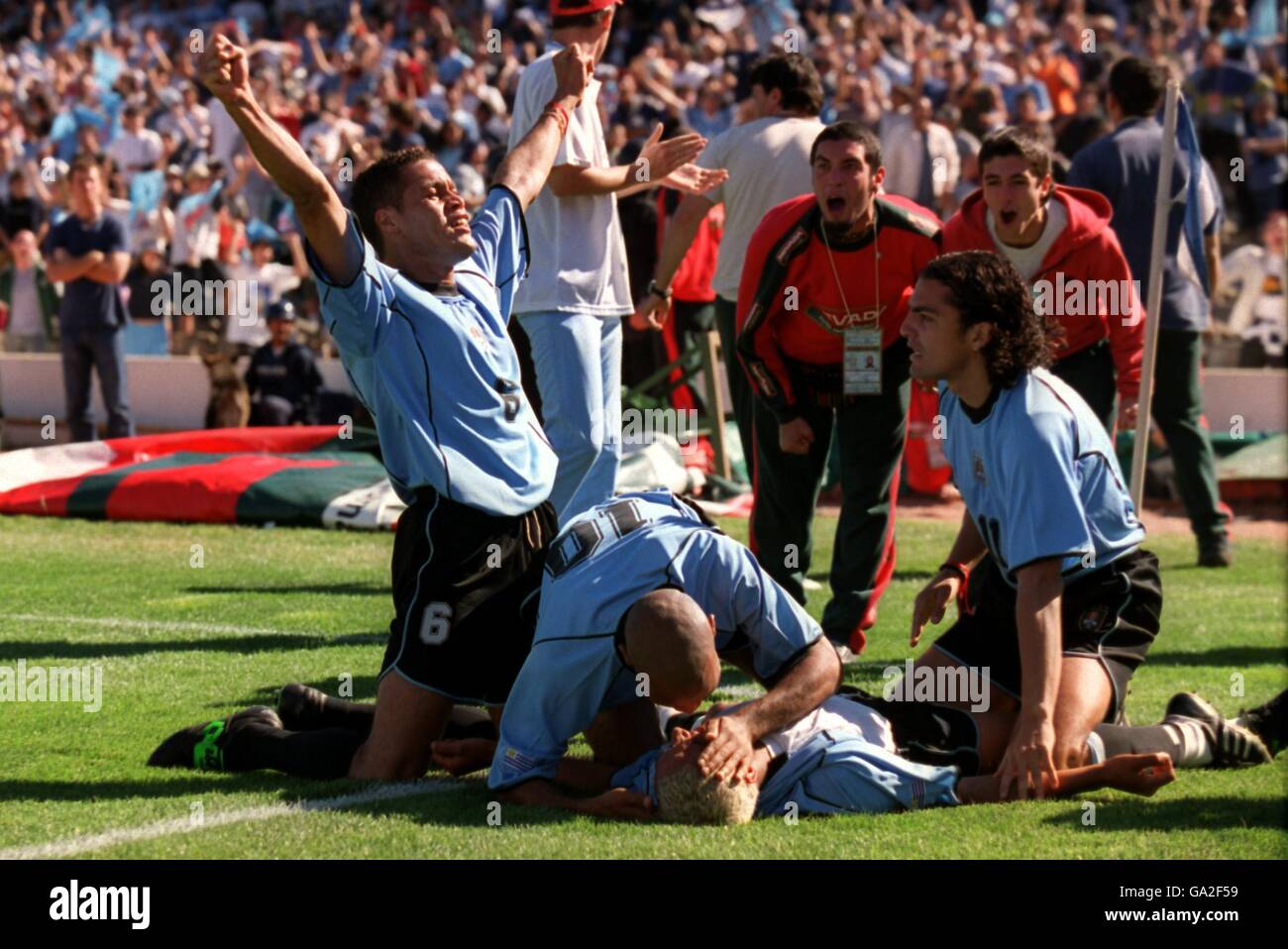 Uruguay players celebrate qualification to the 2002 world cup finals hi ...