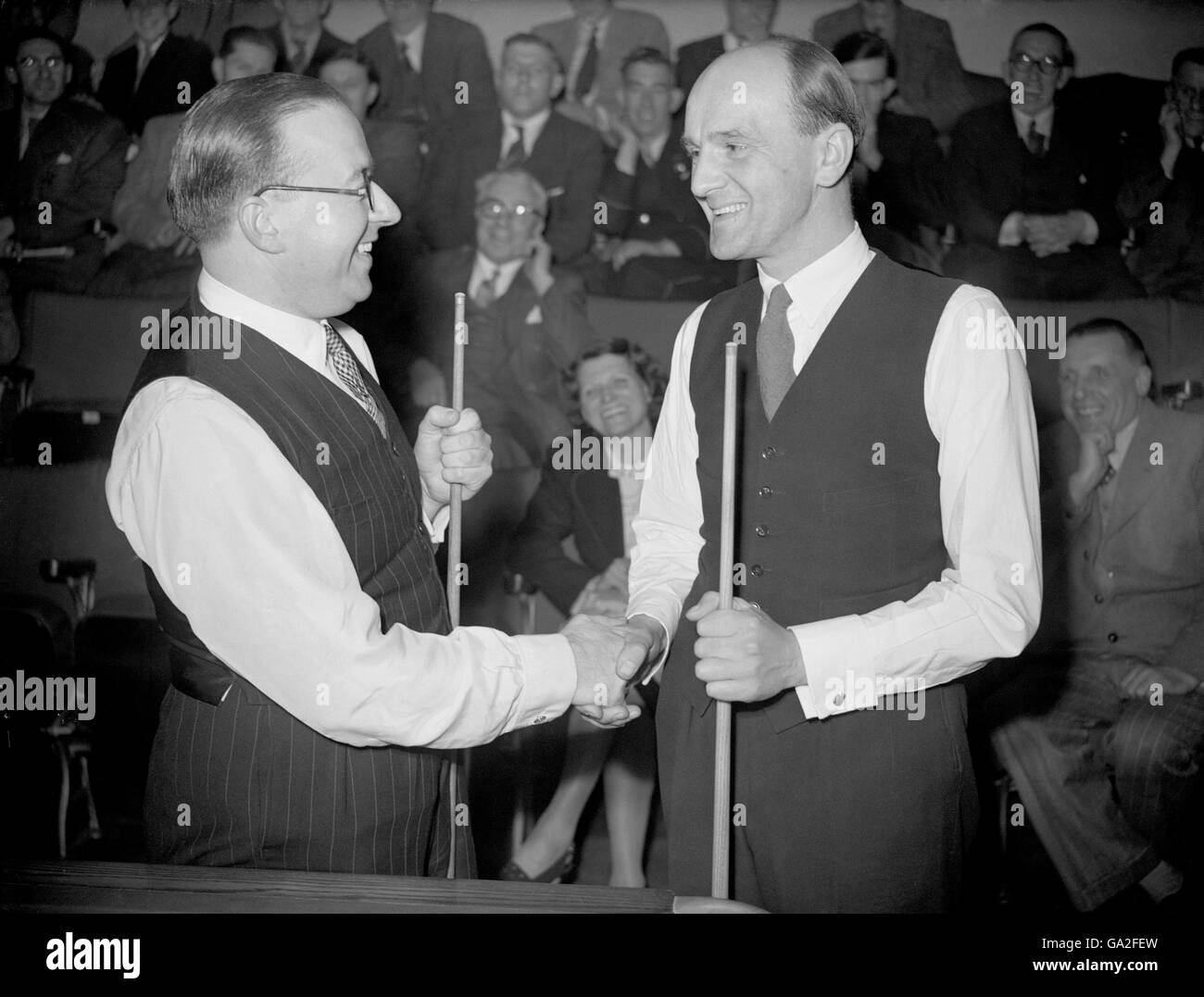 Fred Davis (left) receives congratulations from Walter Donaldson on ...