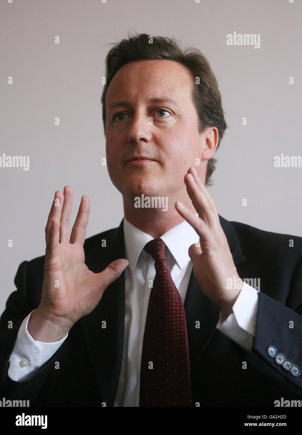 Conservative leader David Cameron talks to staff and patients during a ...