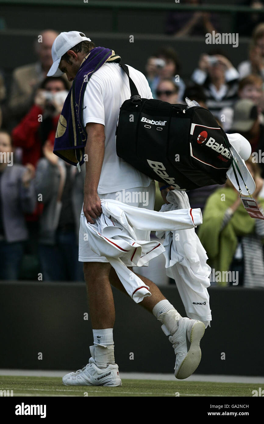 Full length disappointment dejection walking looking down sad bag ...