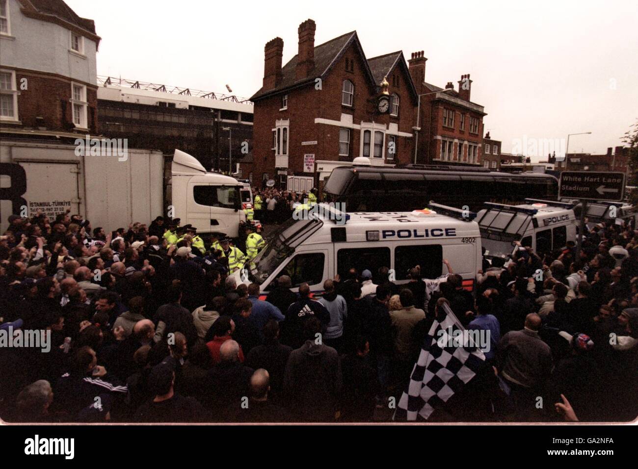 The Tottenham Hotspur team bus arrives at White Hart Lane amid a large ...