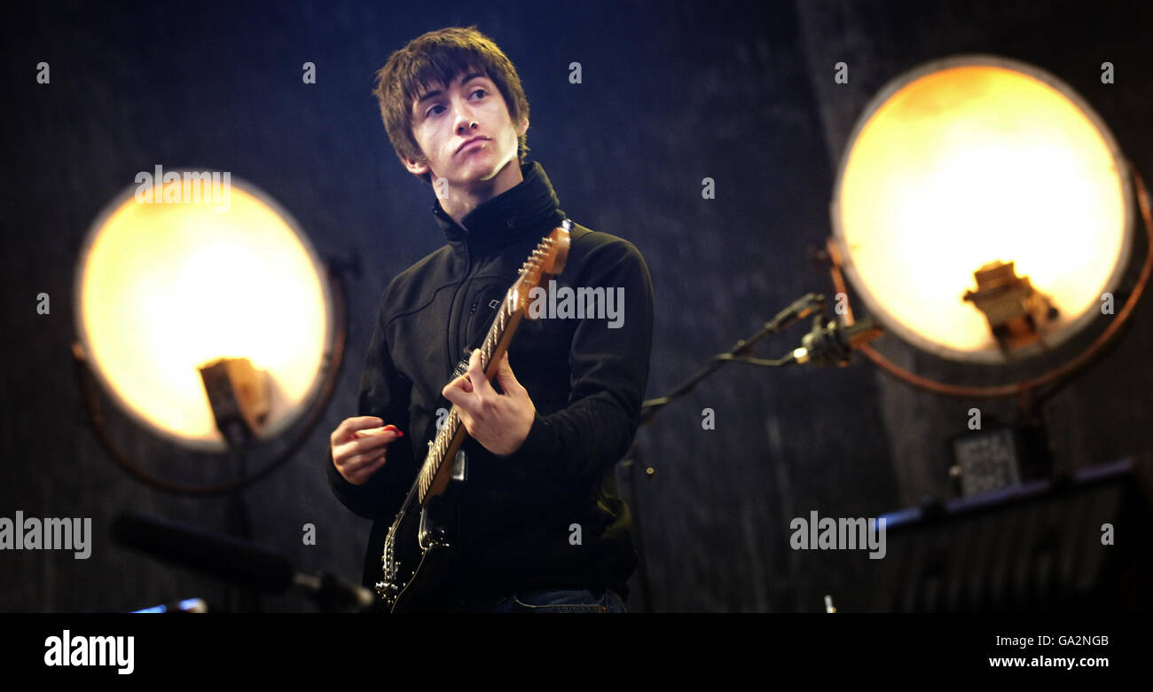 The Arctic Monkeys lead singer Alex Turner performs on stage at T in ...