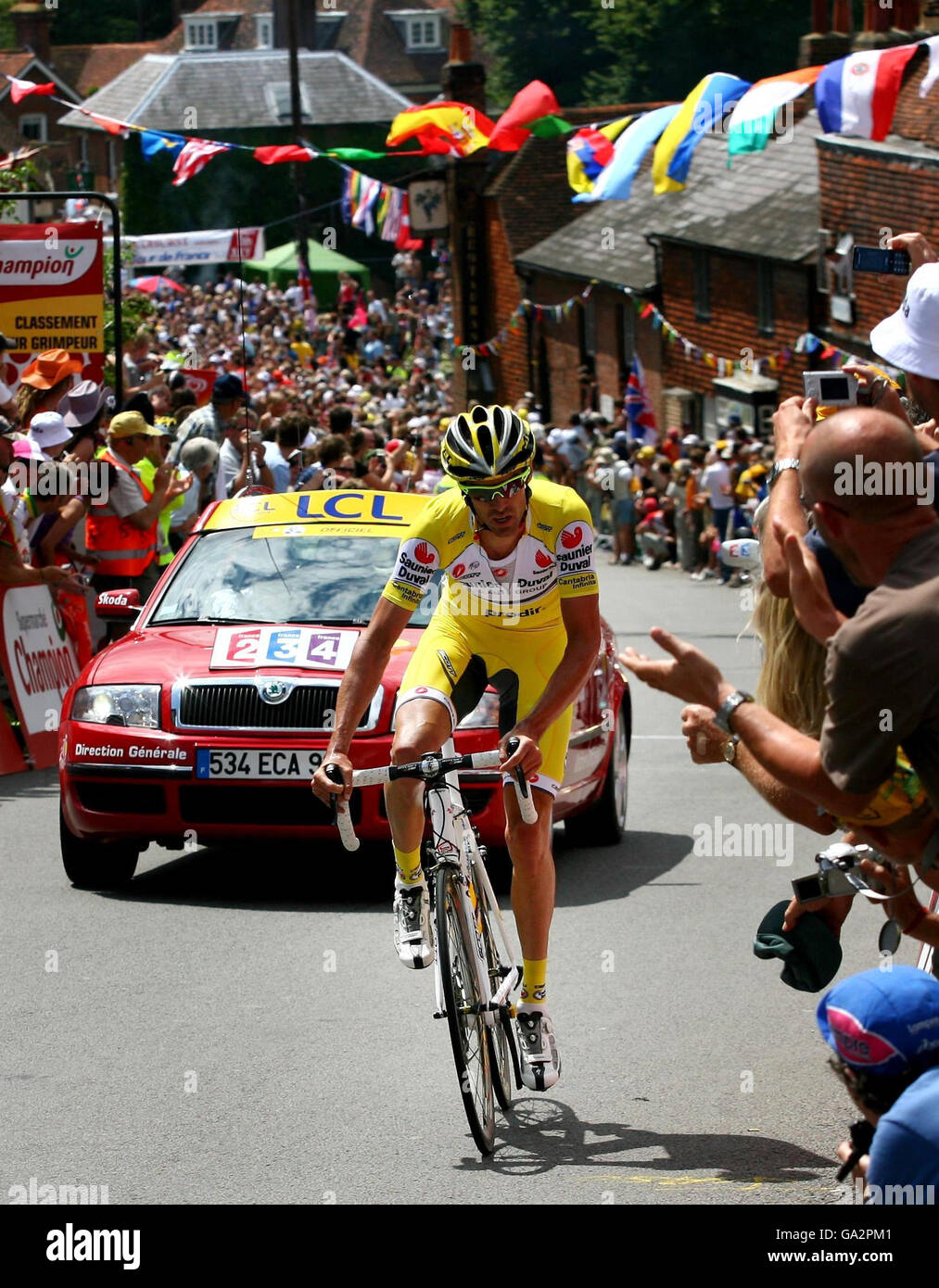 Great Britain's David Millar races through Goudhurst in Kent during the ...