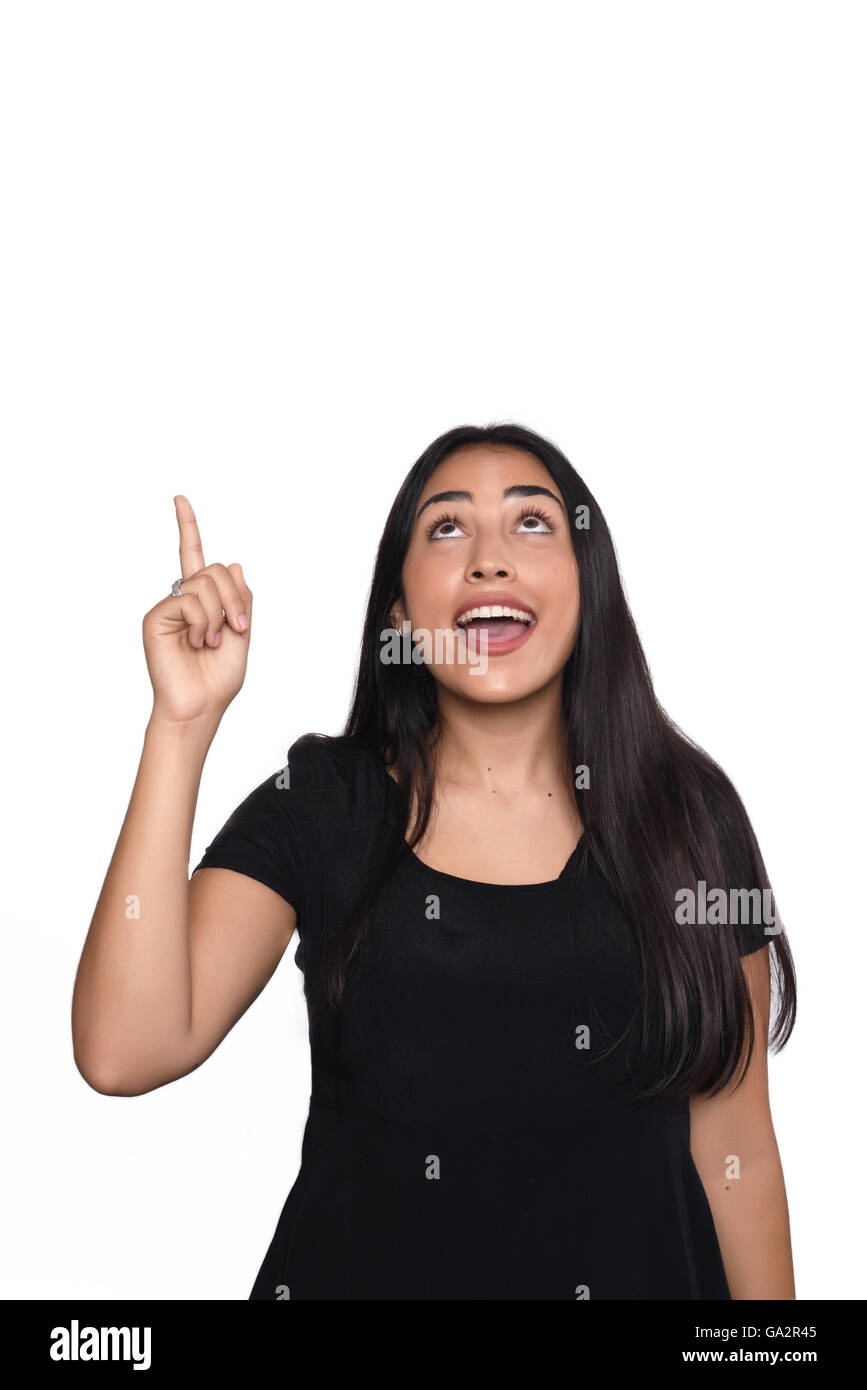 Young beautiful woman pointing at white background Stock Photo - Alamy
