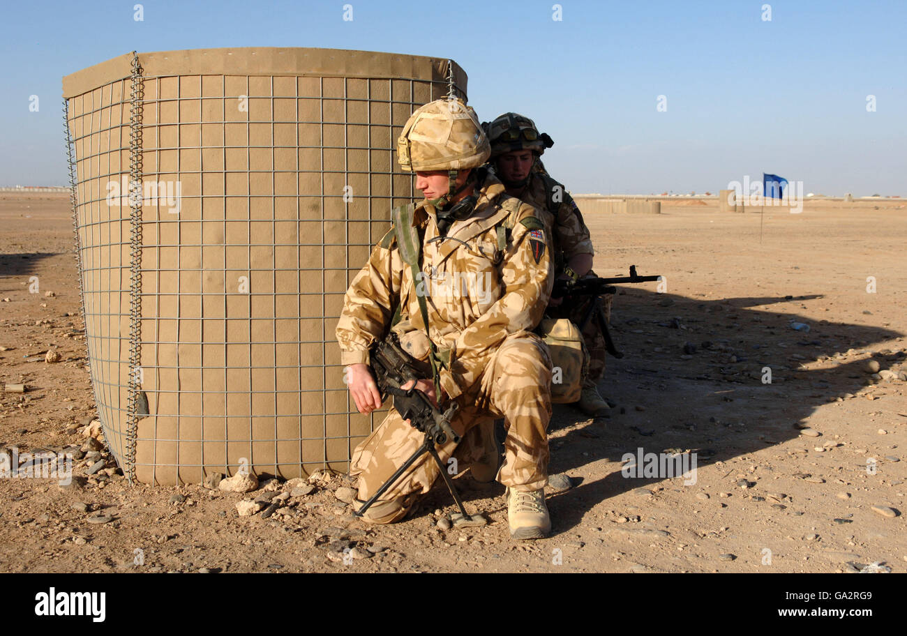 Soldiers from a Royal Marine company, Army Commando 59 practice on a ...