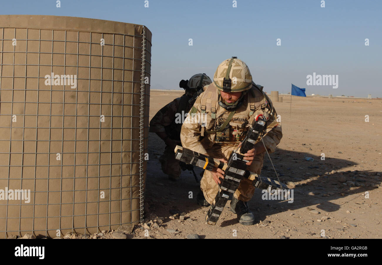 Soldiers from a Royal Marine company, Army Commando 59 practice on a ...