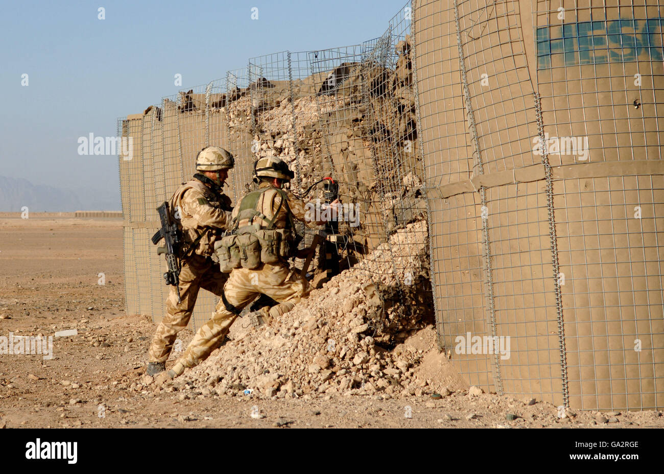 Soldiers from a Royal Marine company, Army Commando 59 practice on a ...