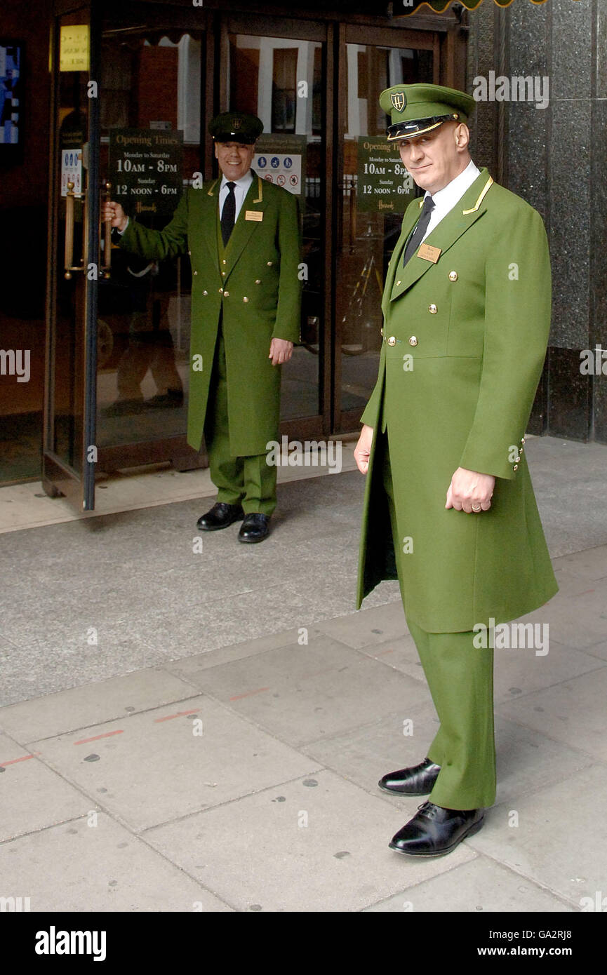 Full length shop shopping door doorman concierge hi-res stock ...