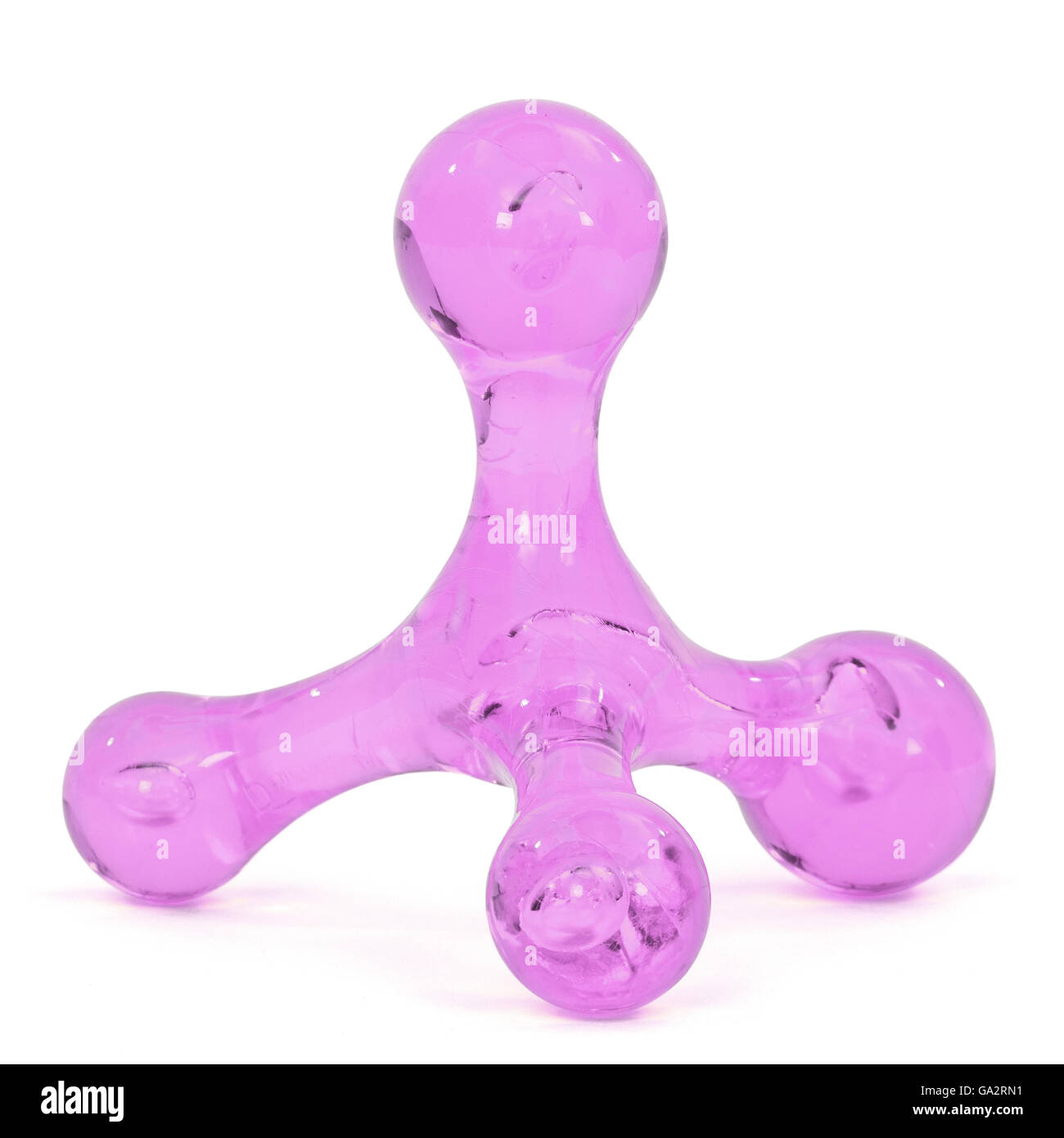 Pink plastic spa massager, isolated on white background, with clipping ...