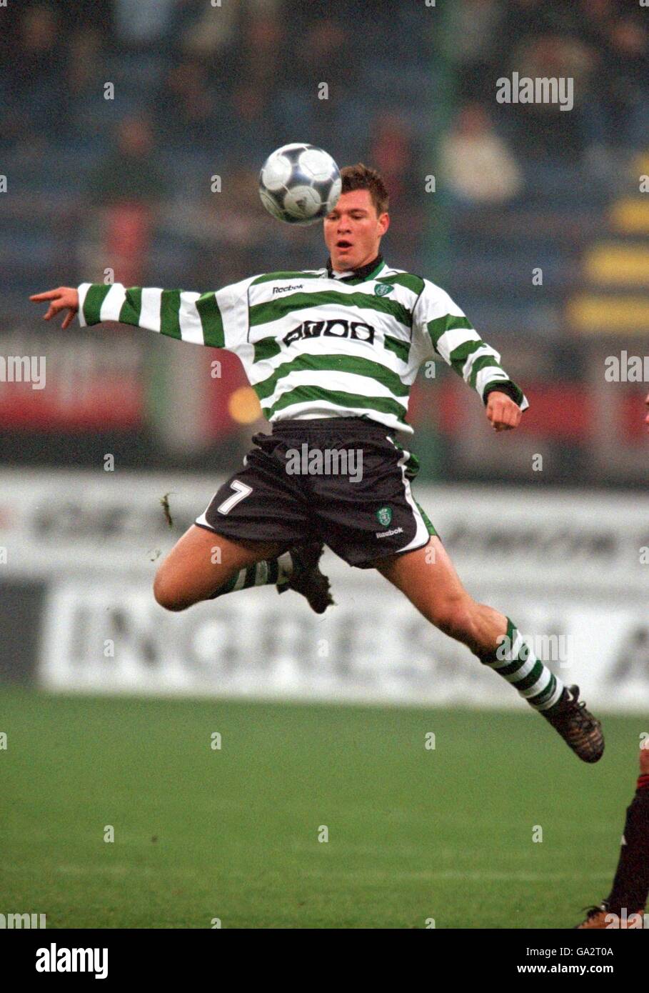 Sporting Lisbon's Marius Niculae jumps to control the ball Stock Photo ...
