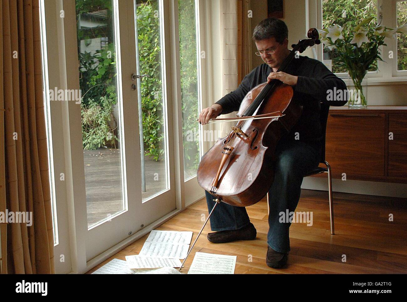 Cellist Paul Watkins practices at home with an 18th century ...