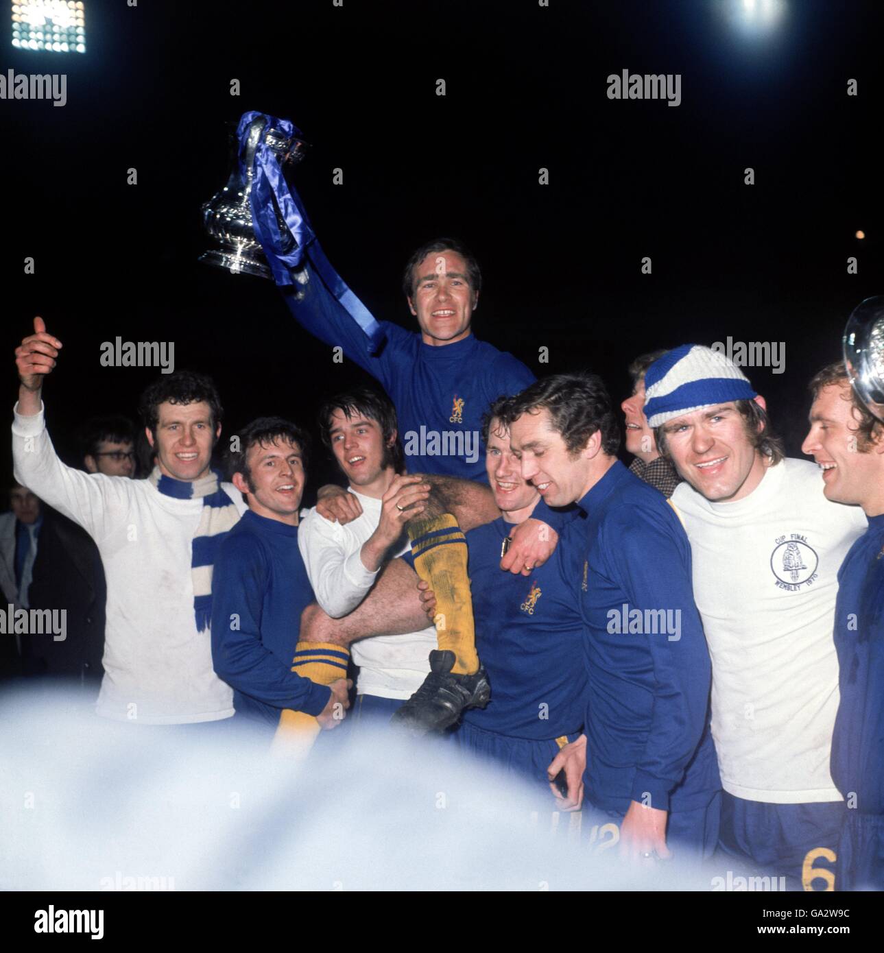 Chelsea's Ron Harris (top) is carried shoulder high by his teammates as ...