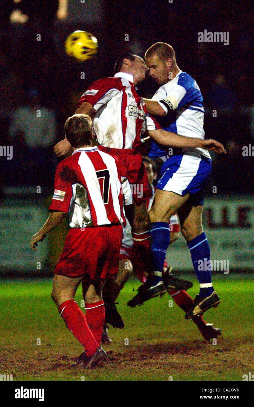 Bristol Rovers' Andy Thomson heads goalward as Dagenham & Redbridge's ...