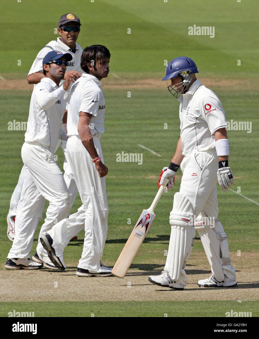 Englands' Matthew Prior (right) heads back to the pavilion after ...