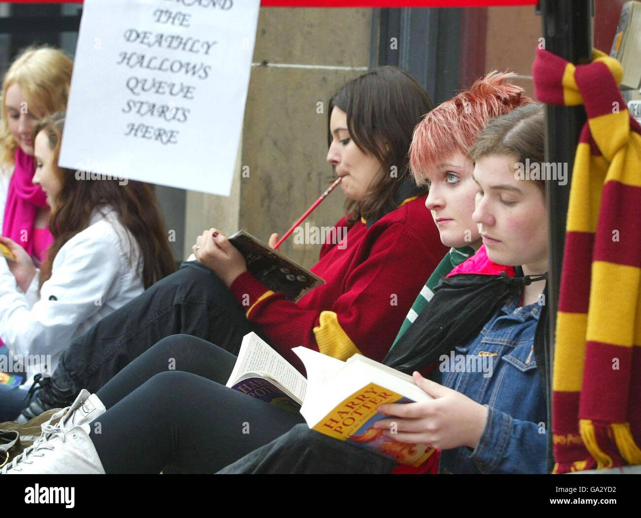 Harry Potter fans start one of the queues at Waterstone`s book shop in ...