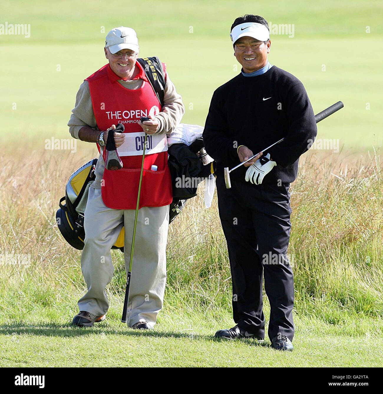 Korea's KJ Choi with his caddie during the second day of The 136th Open ...