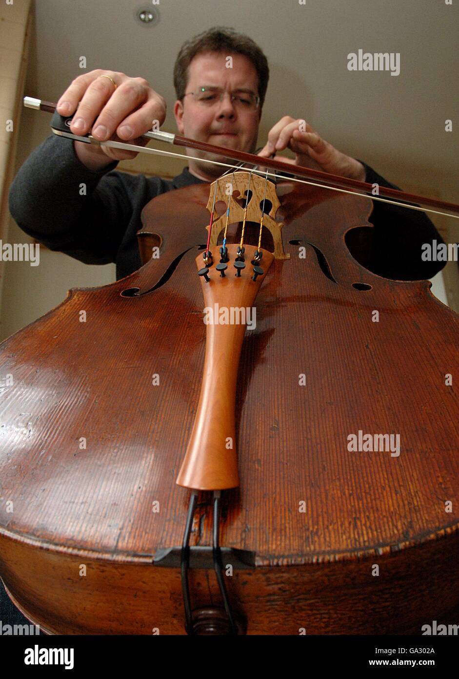 Cellist Paul Watkins practices at home with an 18th century ...