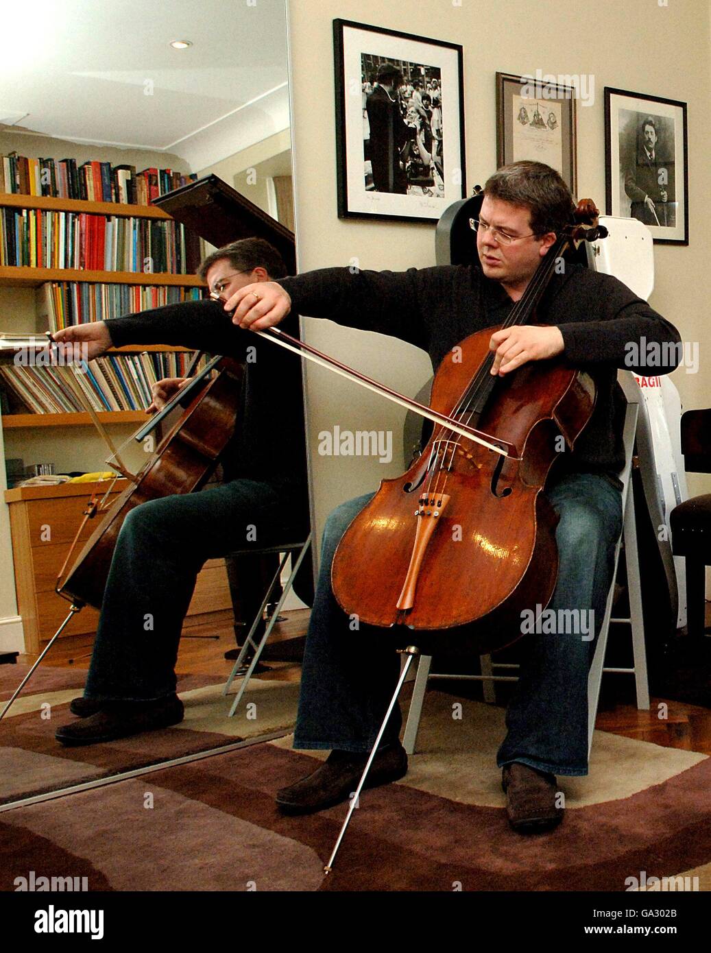 Cellist Paul Watkins practices at home with an 18th century ...