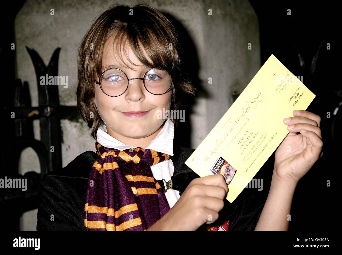 Matthew Pincin, aged nine from Candada poses with the ticket he won to ...