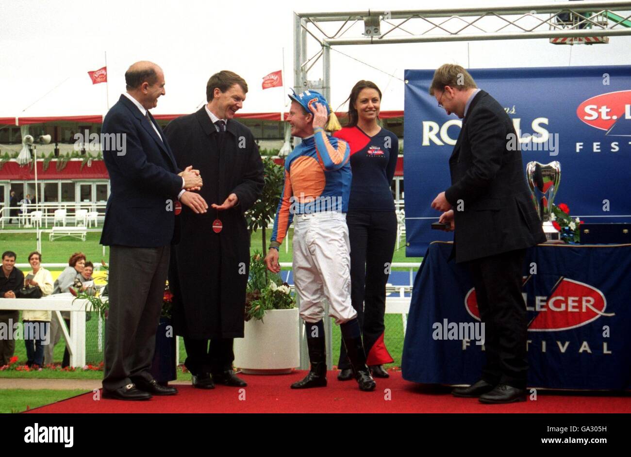 (L-R) Owner Mr M Tabor, Trainer A P O'Brien and Jockey Mick Kinane are ...