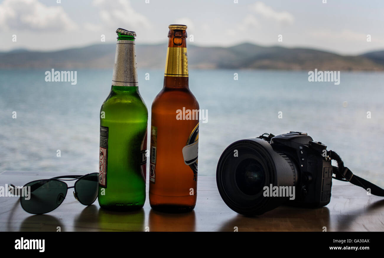 camera and beer near the sea Stock Photo - Alamy