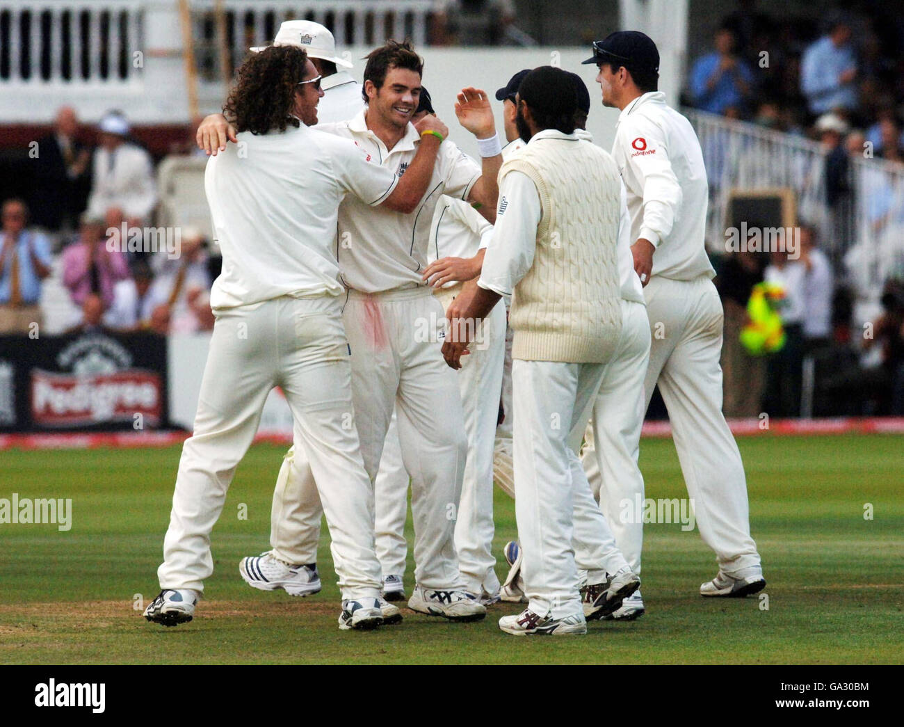 England's James Anderson (centre) celebrates with Ryan Sidebottom after ...