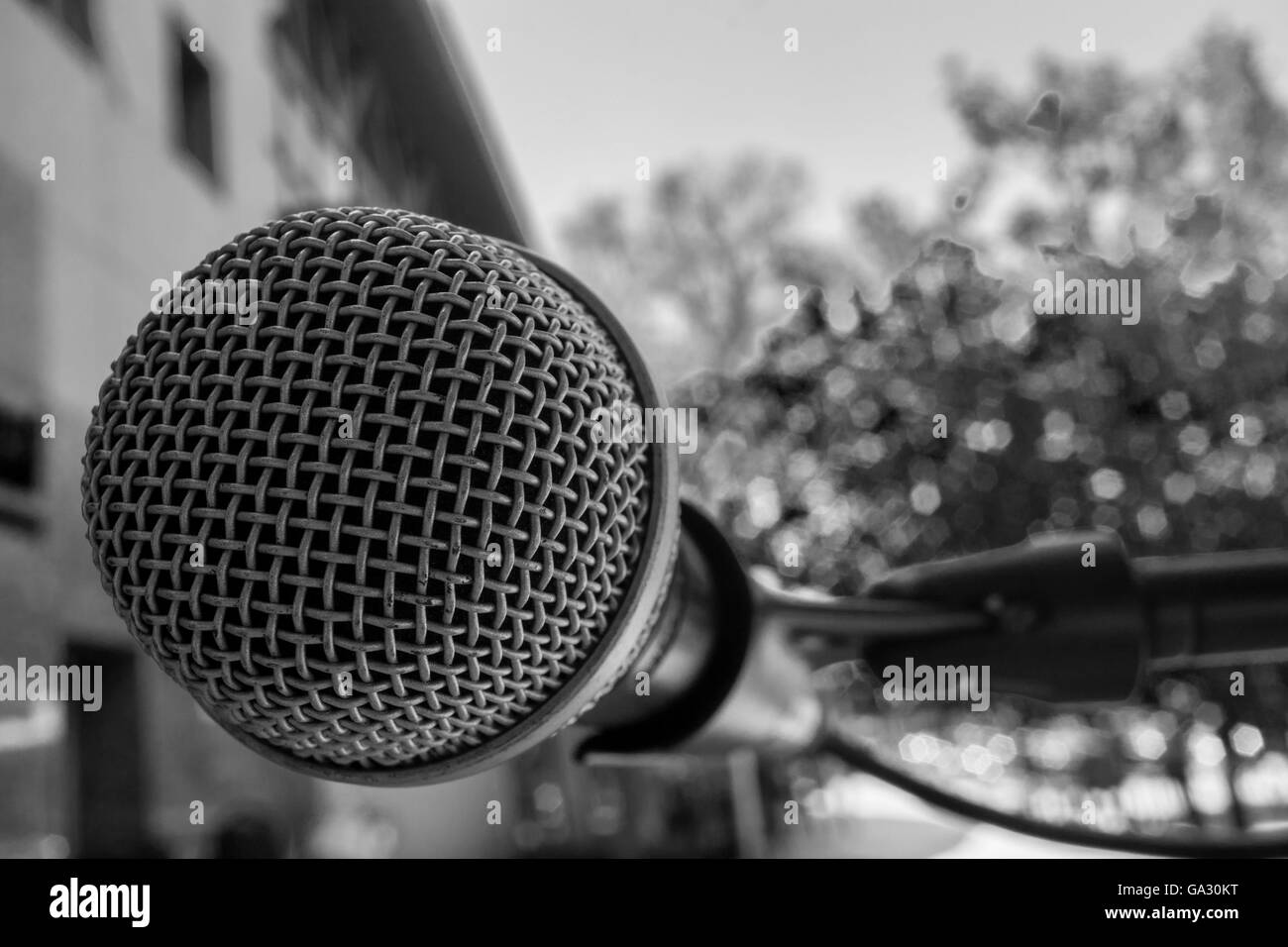 Singer microphone blue Black and White Stock Photos & Images - Alamy