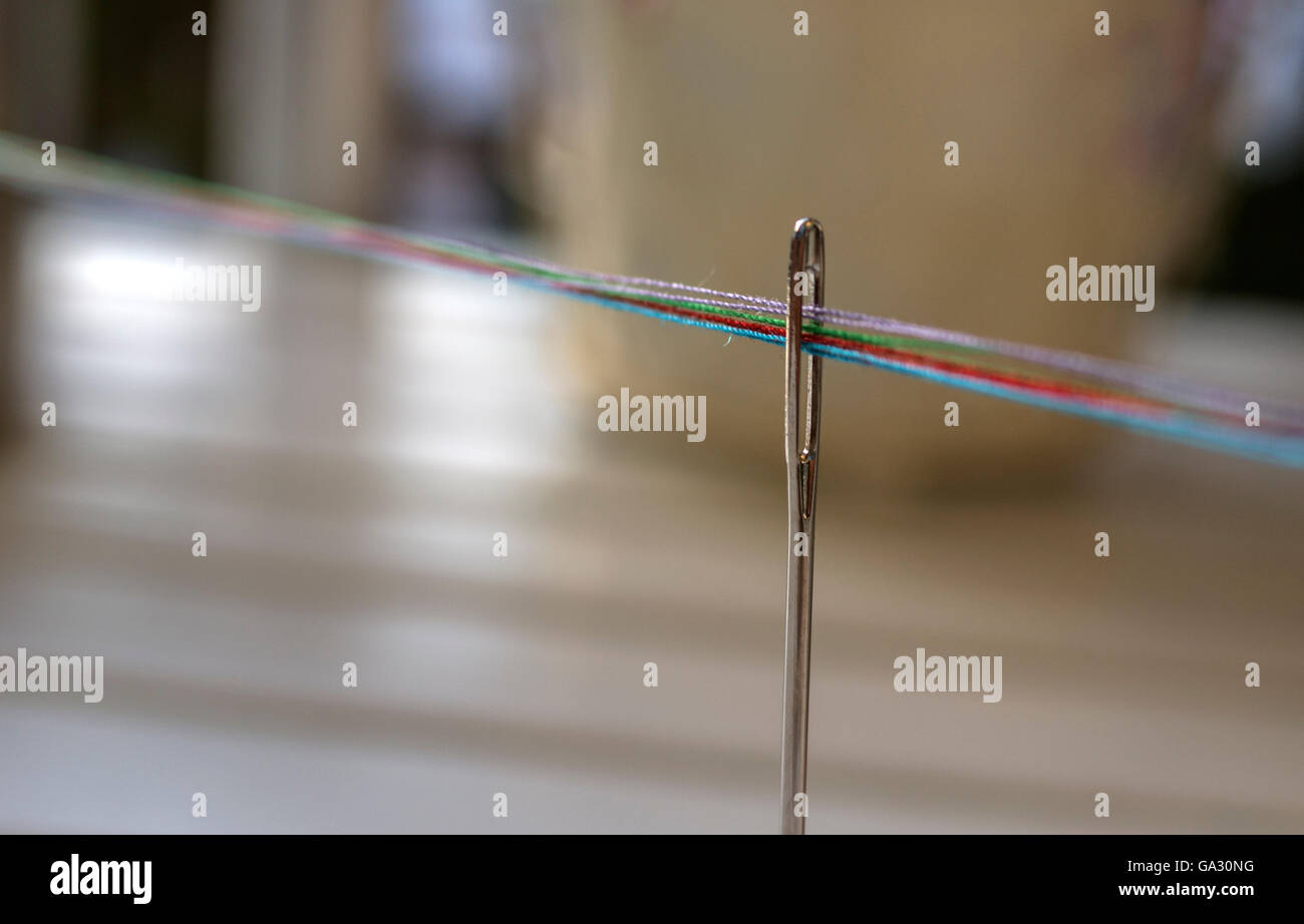 needle and thread Stock Photo - Alamy