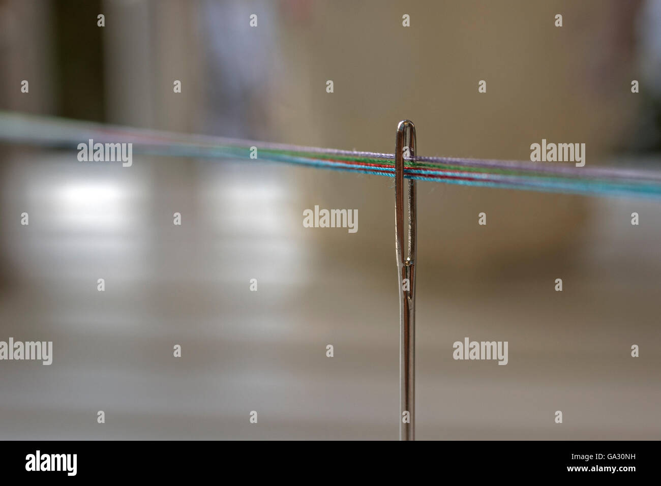 needle and thread Stock Photo - Alamy