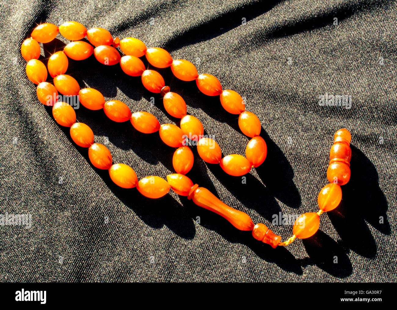 Muslim prayer beads and rosary beads hi-res stock photography and ...