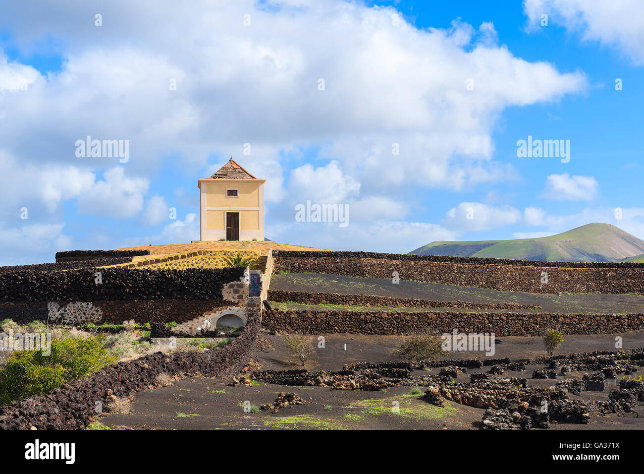 Old tower building in vineyard landscape of Yaiza region, Lanzarote ...