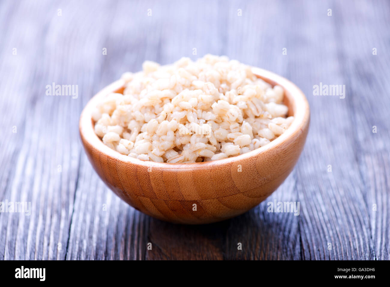 boiled barley porridge in bowl and on a table Stock Photo - Alamy