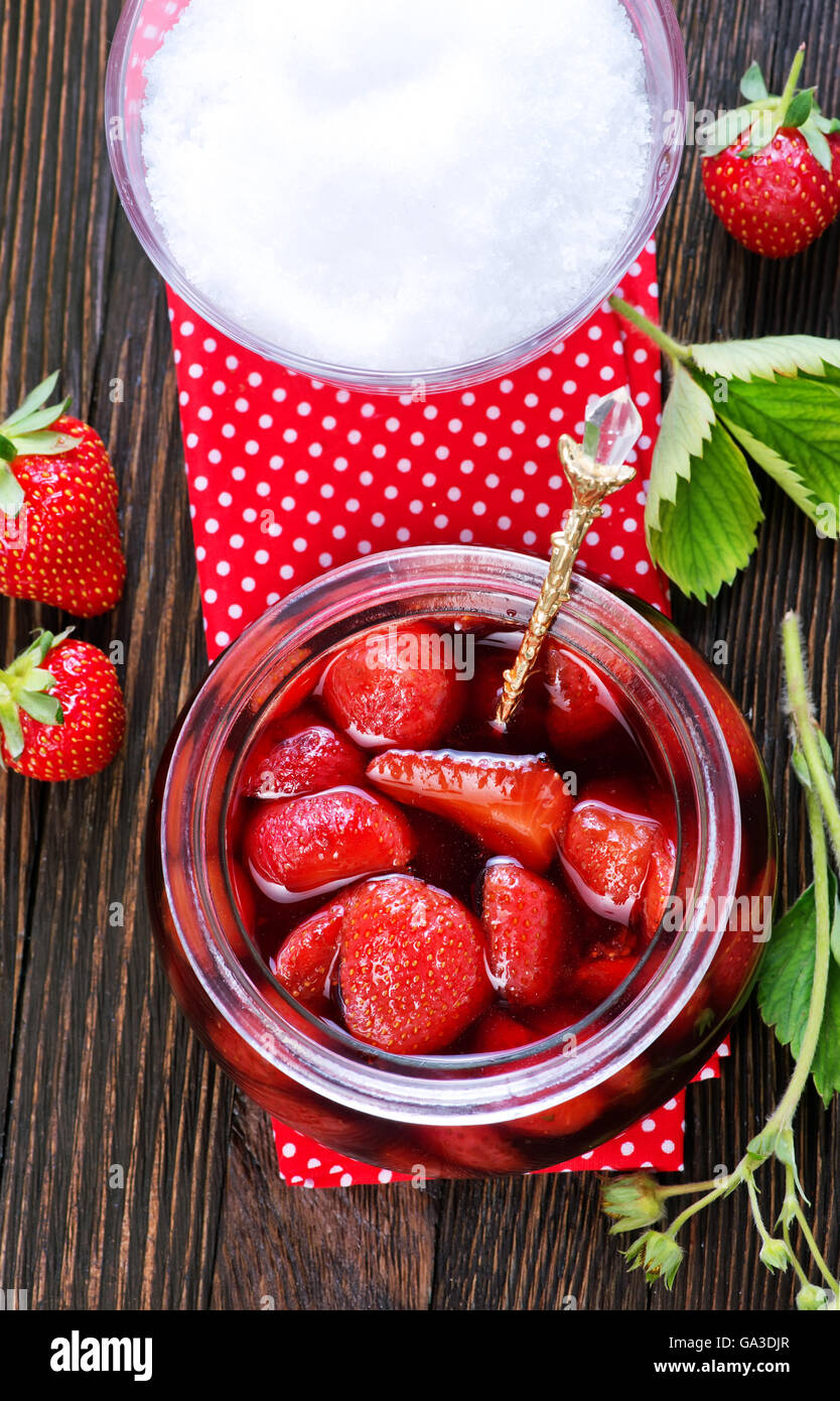 strawberry jam in bank and on a table Stock Photo - Alamy