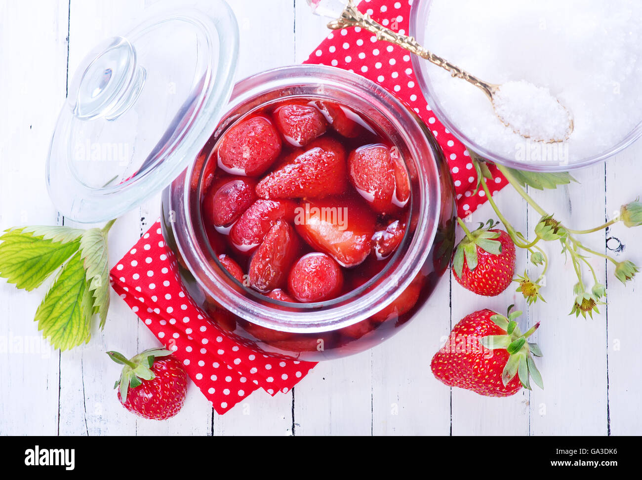 strawberry jam in bank and on a table Stock Photo - Alamy