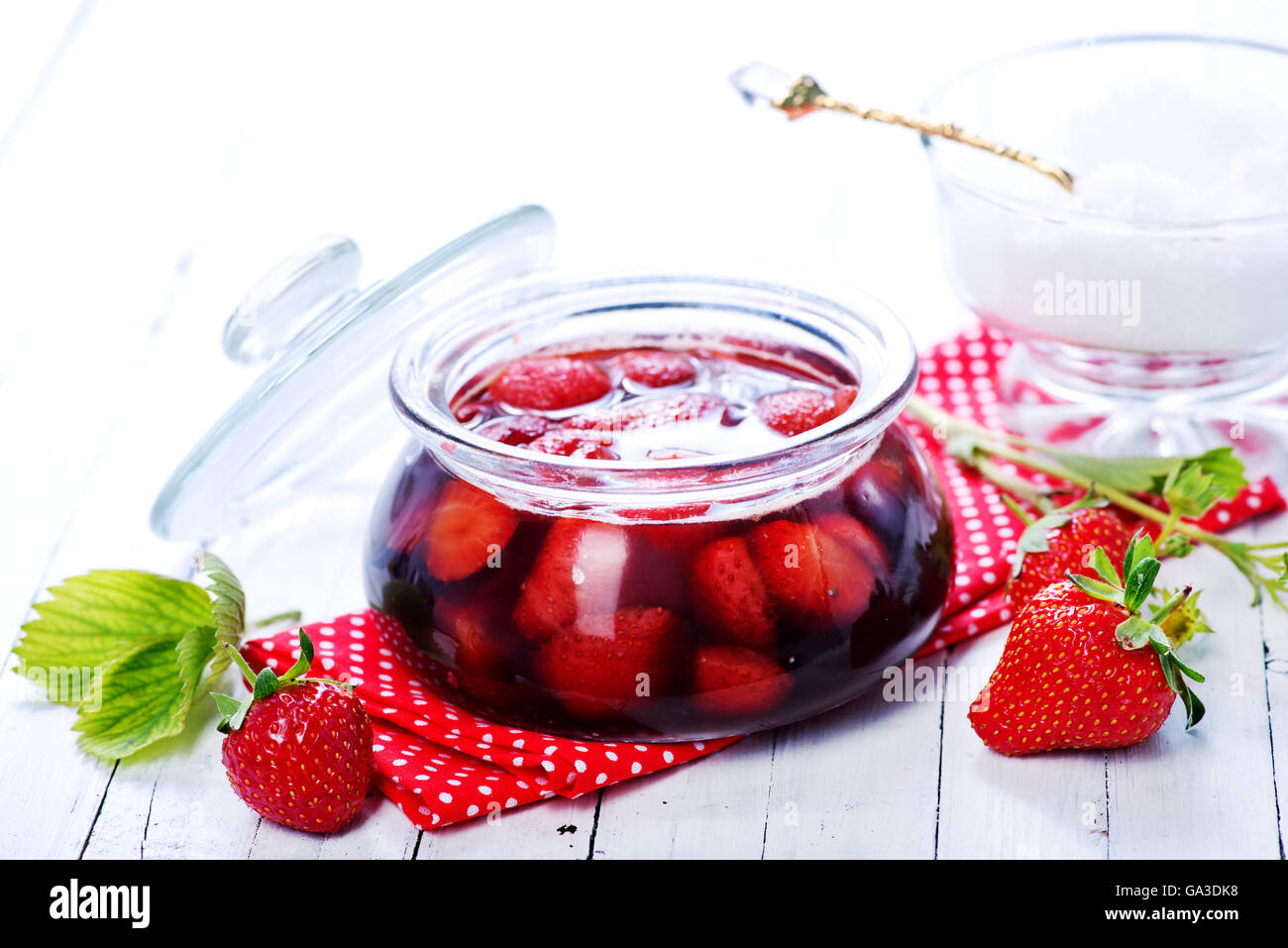 strawberry jam in bank and on a table Stock Photo - Alamy