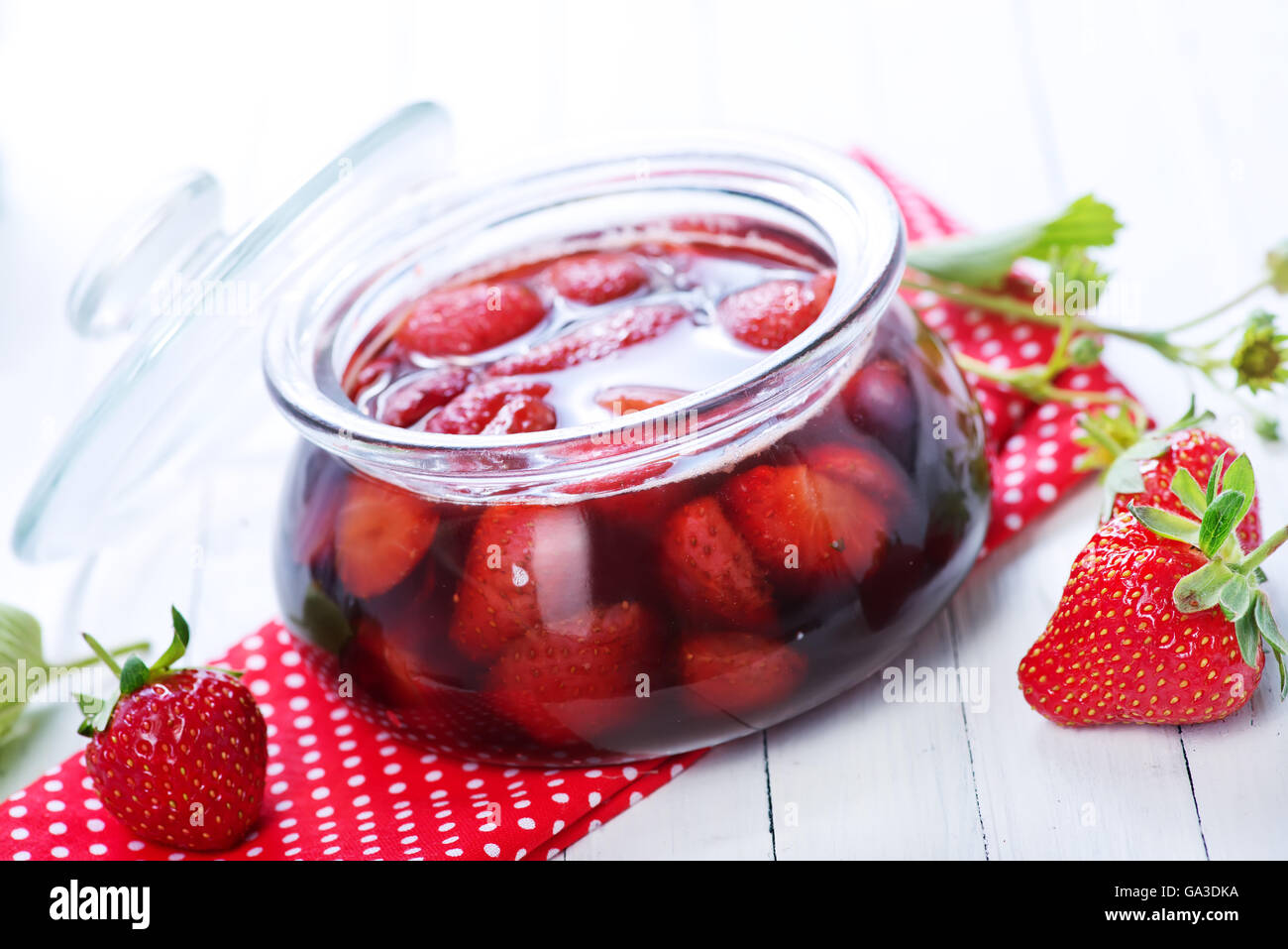 strawberry jam in bank and on a table Stock Photo - Alamy