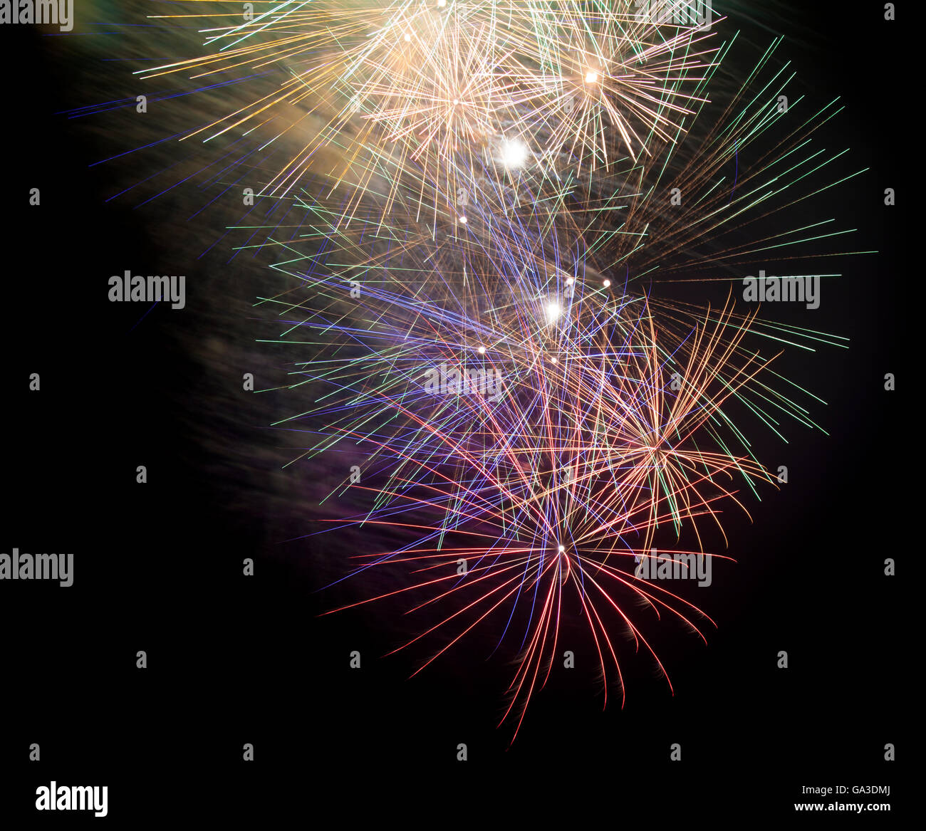 exploding fireworks on black background Stock Photo - Alamy