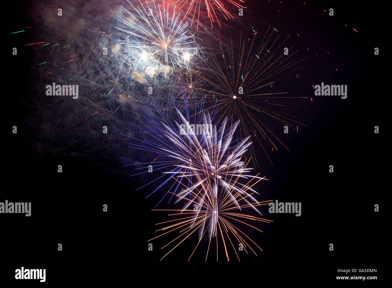 exploding fireworks on black background Stock Photo - Alamy