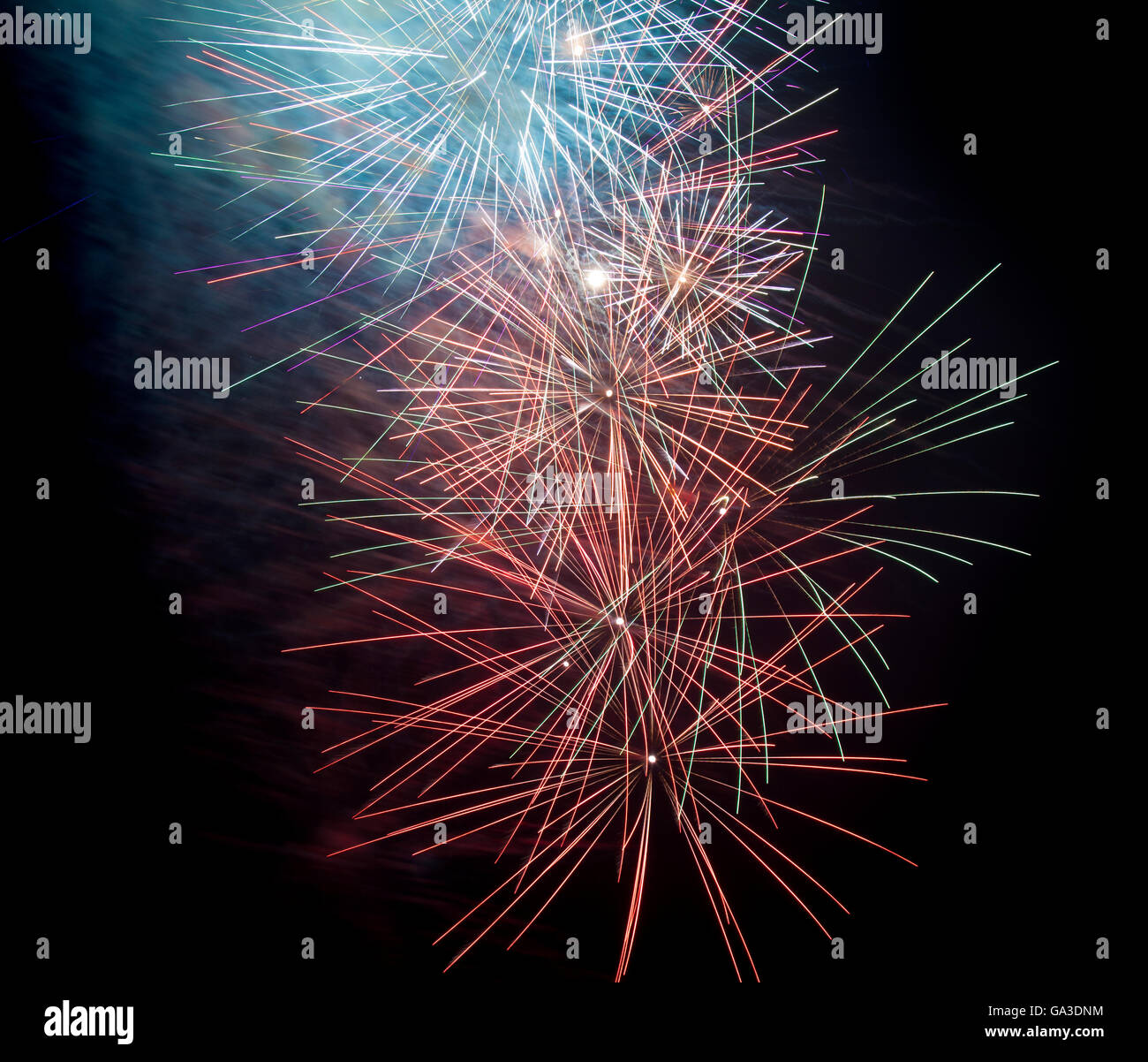 exploding fireworks on black background Stock Photo - Alamy