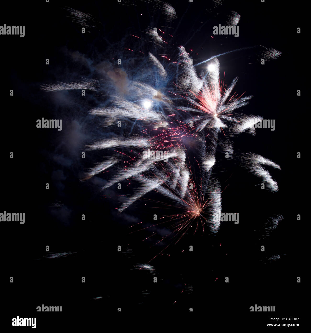 exploding fireworks on black background Stock Photo - Alamy