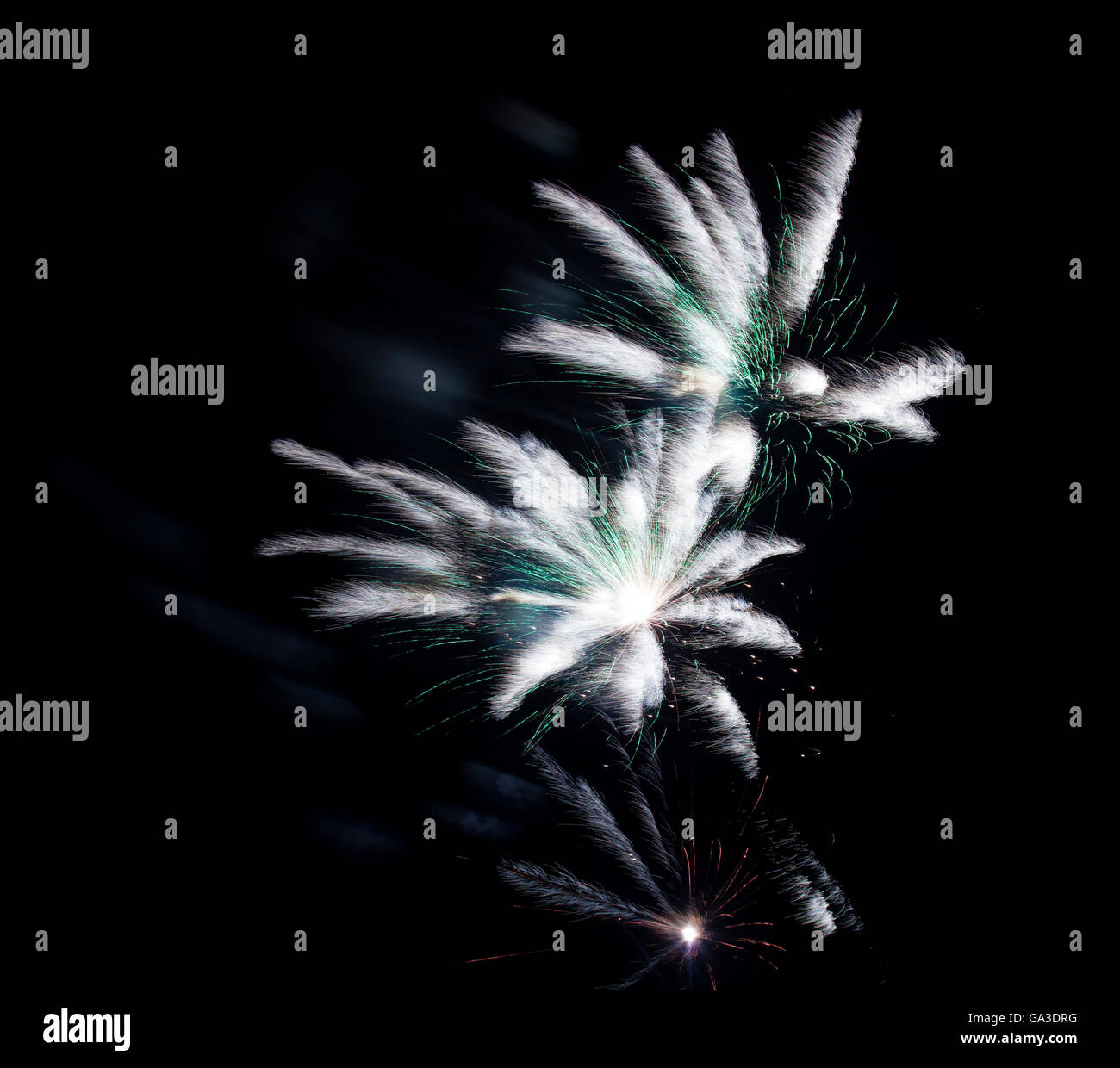 exploding fireworks on black background Stock Photo - Alamy