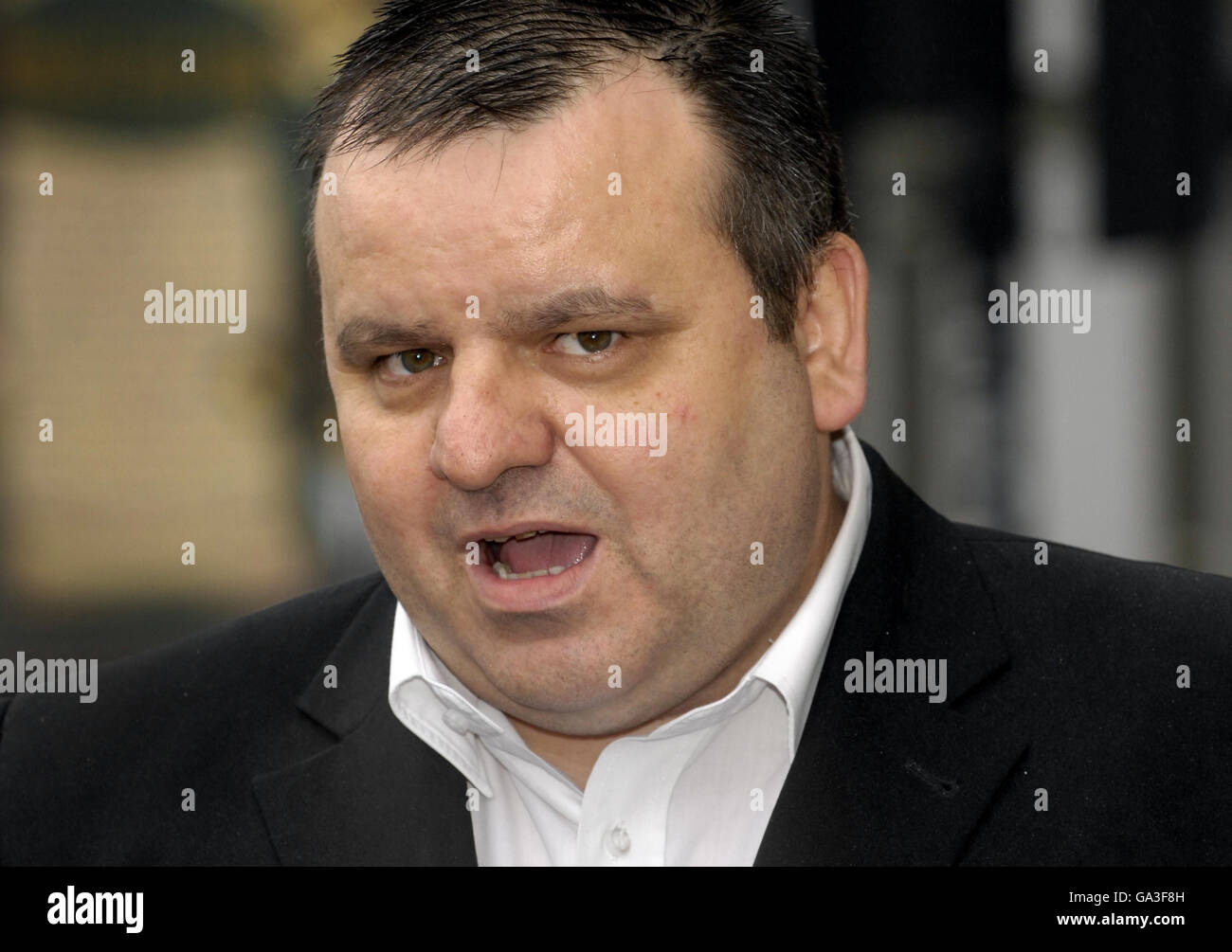 Half length mid top eye contact talking serious scotland mangrk hi-res ...