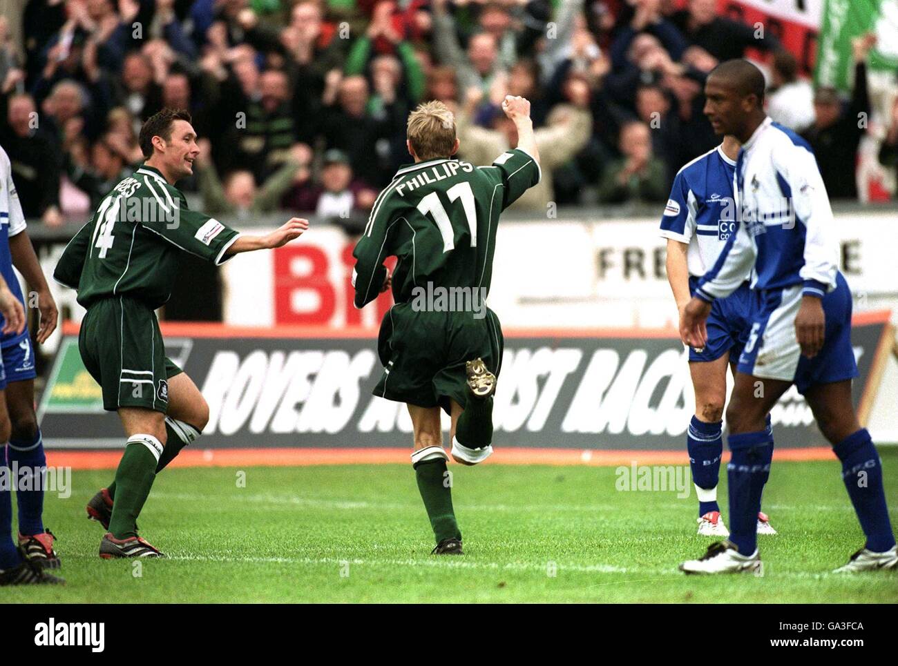 Martin Phillips goes away to celebrate the first goal at Bristol Rovers ...